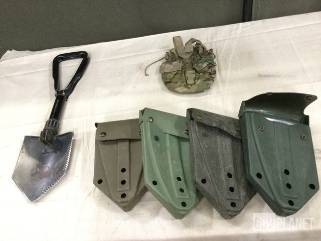 Surplus (24) Canteens, (31) Intrenching Carriers, (1) Intrenching Tool ...