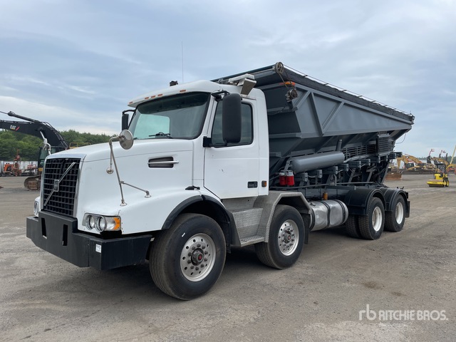 2002 Volvo VHD 8x4 Twin-Steer Stone Spreader Truck | Ritchie Bros ...