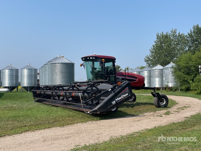 2010 Premier M100 30 ft Swather Windrower | Ritchie Bros. Auctioneers
