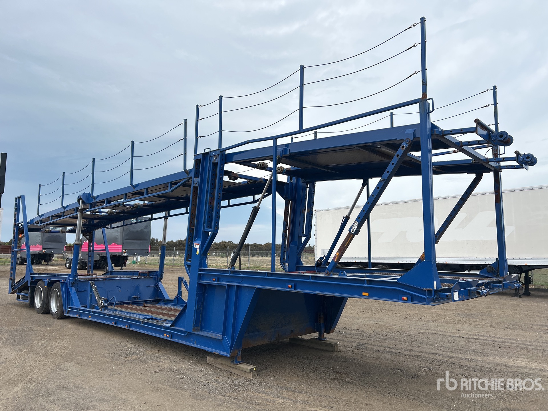 2002 Progressive Bogie/A 6 Car Open Car Carrier Trailer | Ritchie Bros ...