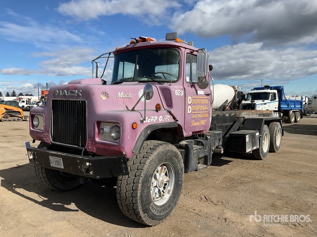 1984 Mack DM686S 6x4 Roll-Off Truck | Ritchie Bros. Auctioneers