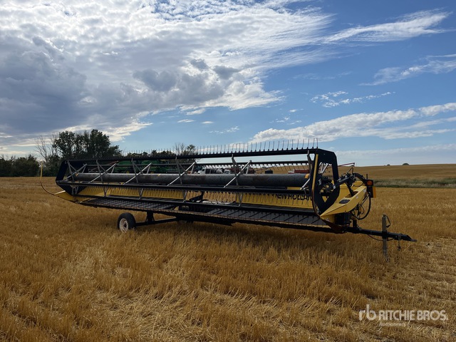 2001 Honey Bee 94C 30 ft Draper Combine Header | Ritchie Bros. Auctioneers