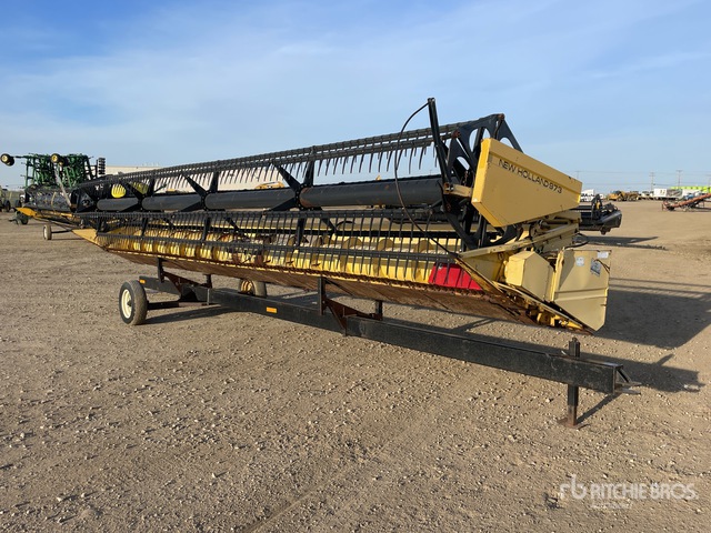 1992 New Holland 971 30 ft Rigid Combine Header | Ritchie Bros. Auctioneers