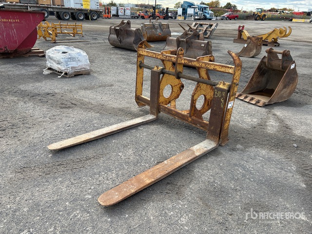 Cat 58 in Backhoe Forks | Ritchie Bros. Auctioneers