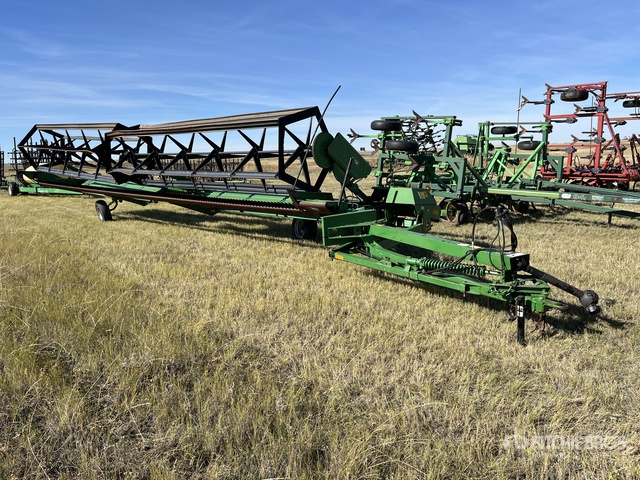 1990 John Deere 590 36 ft Pull Type Swather Windrower | Ritchie Bros ...