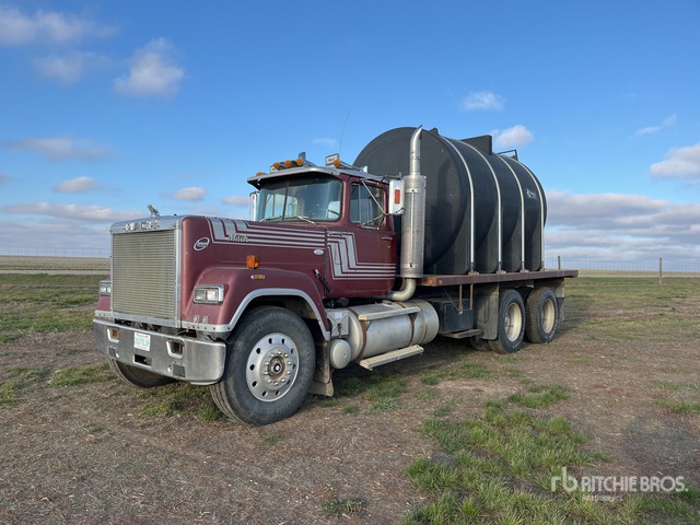 1985 Mack RW613 15140 L 6x4 Flatbed Water Truck | Ritchie Bros. Auctioneers