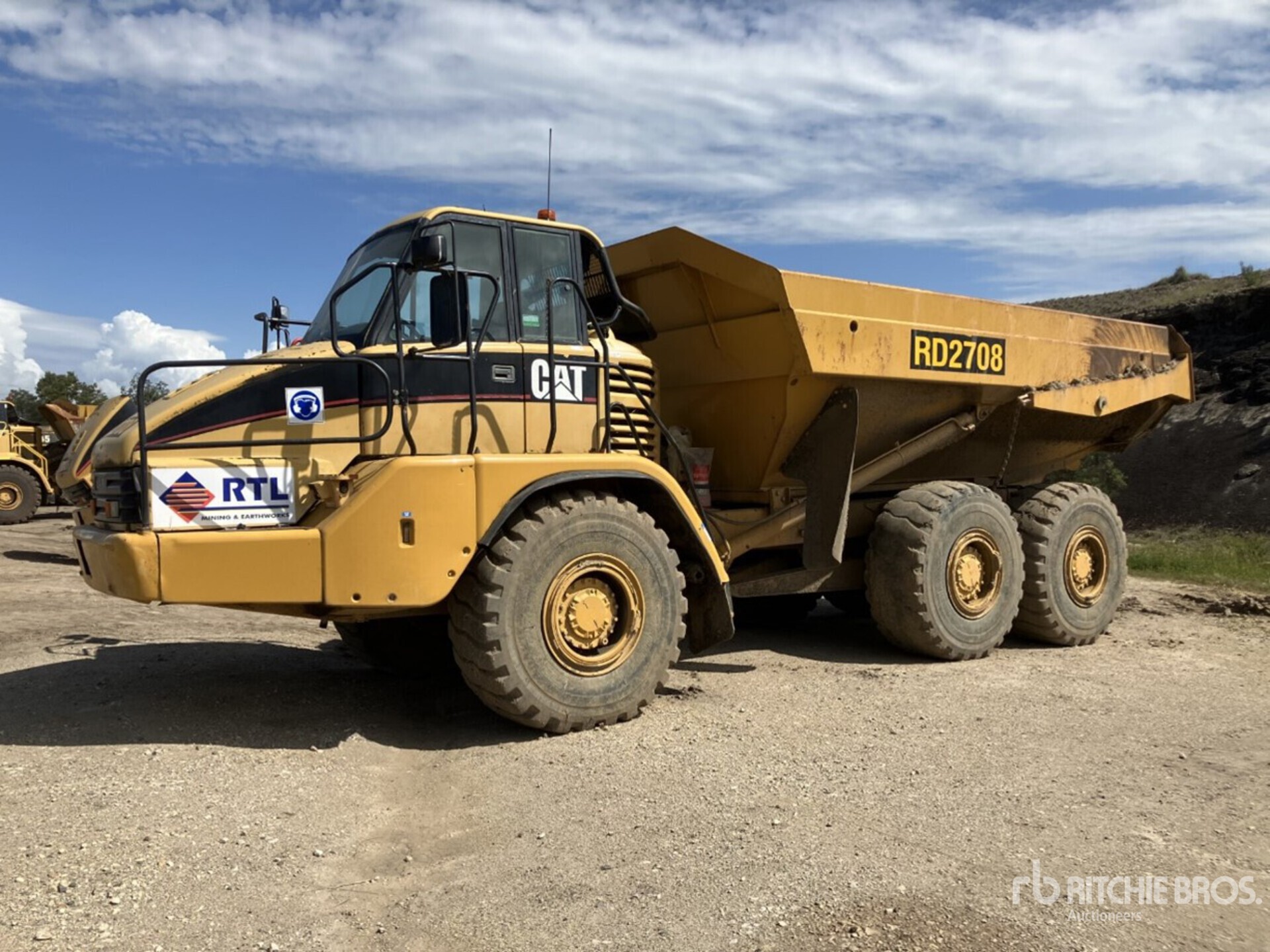 2003 Cat 730 Camión Dumper Articulado | Ritchie Bros. Auctioneers