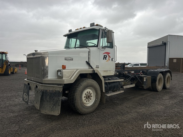 1990 Autocar ACL64F 6x4 Roll-Off Truck | Ritchie Bros. Auctioneers