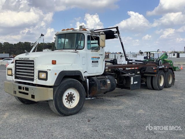 1995 Mack RD690S 6x4 Roll-Off Truck | Ritchie Bros. Auctioneers