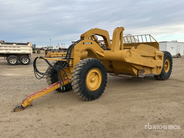 Cat 70 4 Tire Pull Scraper | Ritchie Bros. Auctioneers