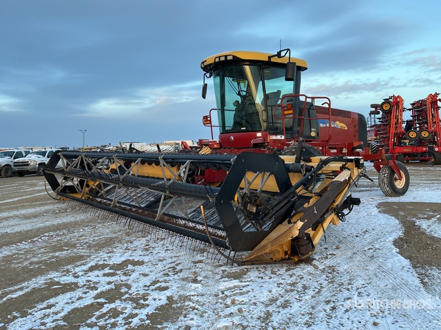 2010 New Holland H8040 25 ft Swather Windrower | Ritchie Bros. Auctioneers