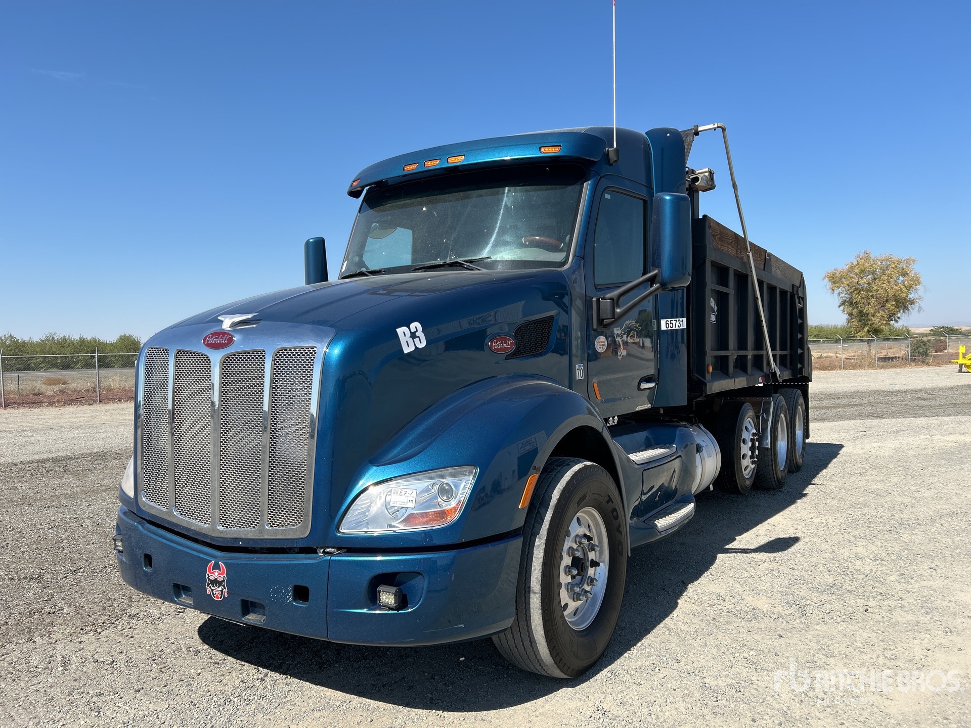 2016 Peterbilt 579 8x4 Tri/A Dump Truck | Ritchie Bros. Auctioneers
