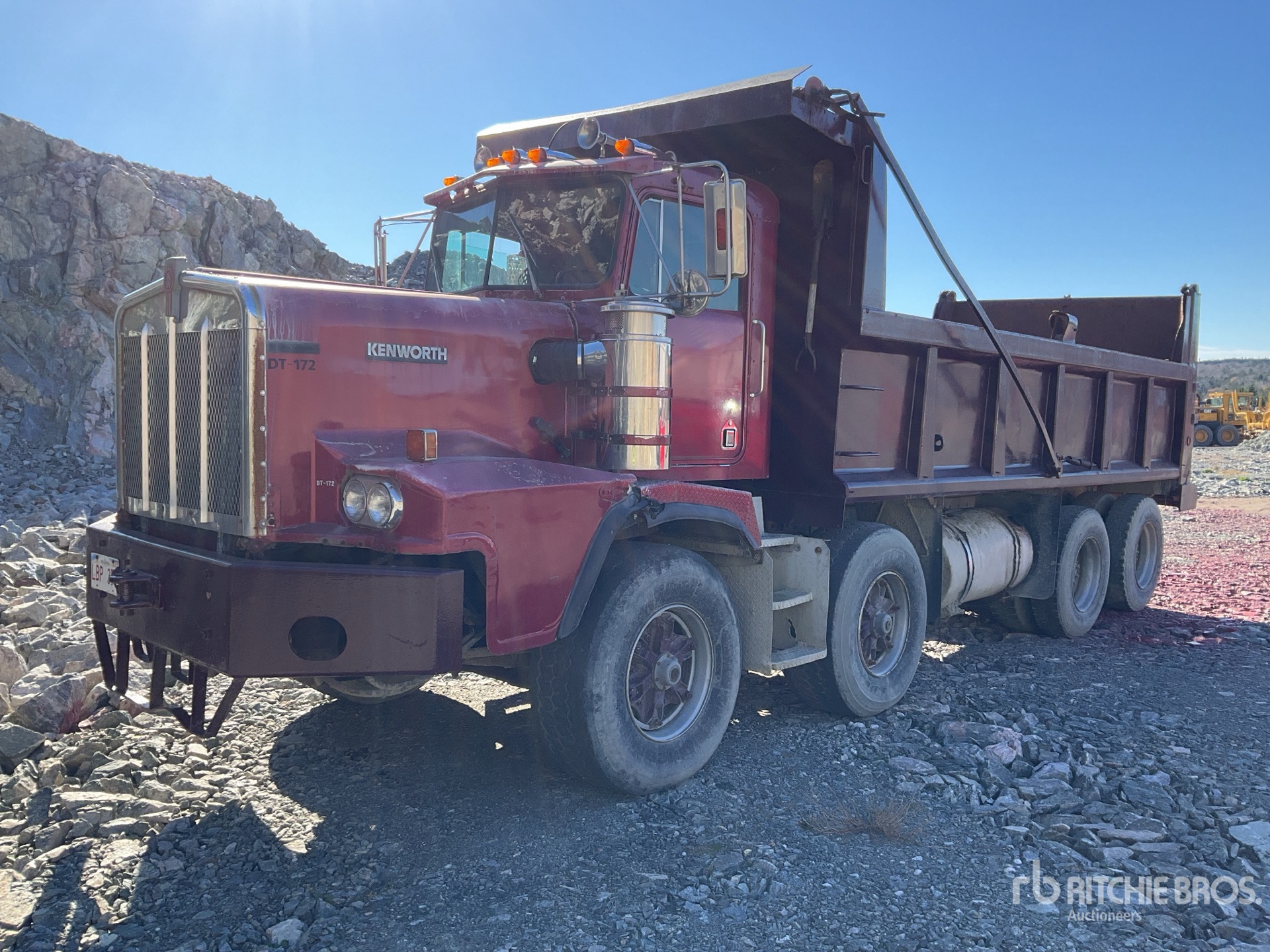 1987 Kenworth C550 8x4 Twin-Steer T/A Camión dumper | Ritchie Bros ...