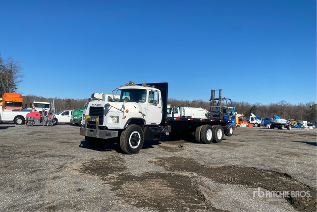 1998 Mack DM688S 6x4 Flatbed Truck | Ritchie Bros. Auctioneers