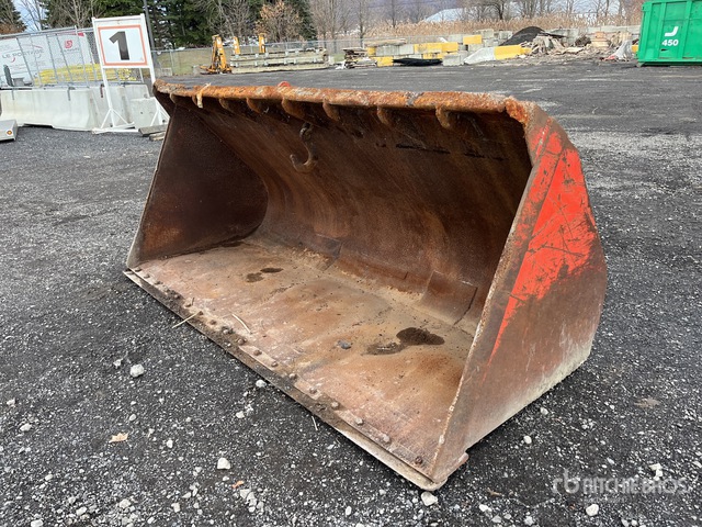 Cat 108 in Wheel Loader Bucket | Ritchie Bros. Auctioneers