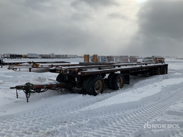 2007 Titan Quad/A Pup Lugger Trailer | Ritchie Bros. Auctioneers