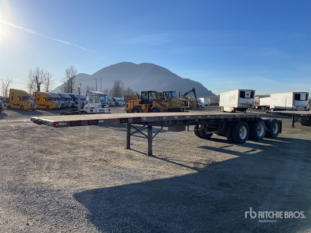 1998 Magnum 32 ft Tri/A B-Train Lead Flatbed Trailer | Ritchie Bros ...