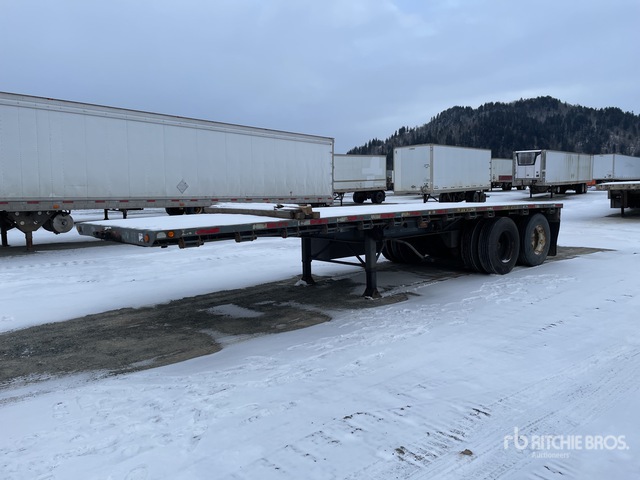 2007 Doepker 28 ft T/A B-Train Pup Flatbed Trailer | Ritchie Bros ...
