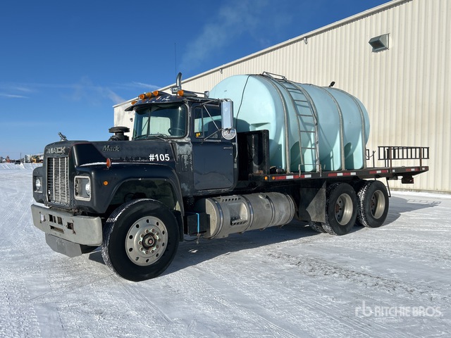 1986 Mack R688ST 6x4 Flatbed Truck | Ritchie Bros. Auctioneers