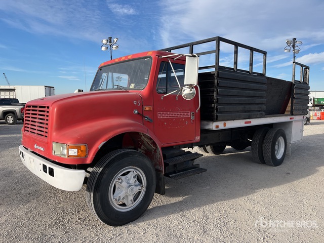 1990 International 4700 4x2 Flatbed Truck | Ritchie Bros. Auctioneers