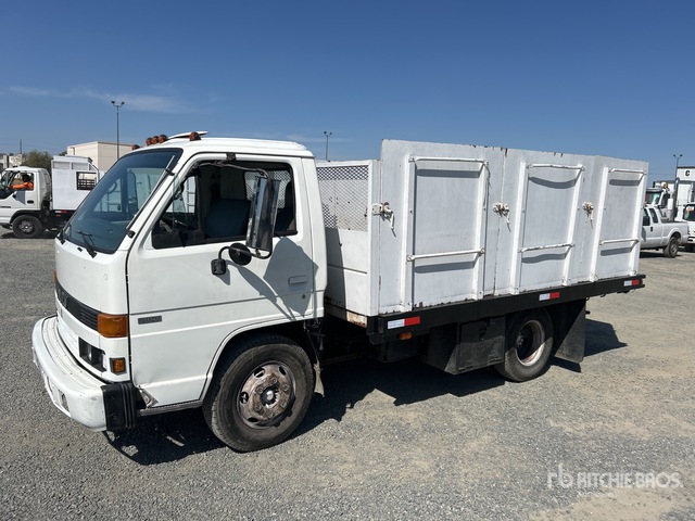 1992 Isuzu NPR 4x2 Flatbed Truck | Ritchie Bros. Auctioneers