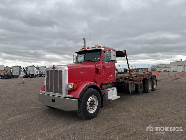 2002 Peterbilt 357 8x4 Roll-Off Truck | Ritchie Bros. Auctioneers