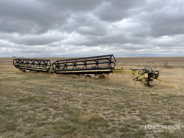 1989 Honey Bee TM-50 50 ft Pull Type Swather Windrower | Ritchie Bros ...