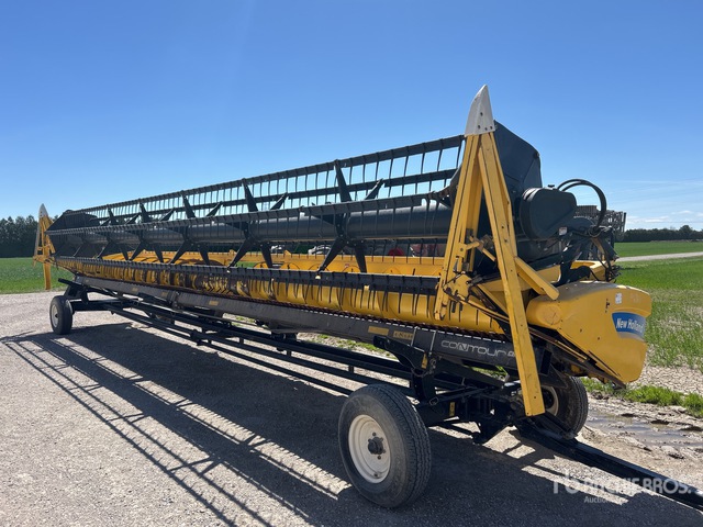2009 New Holland 74C 35 ft Flex Combine Header | Ritchie Bros. Auctioneers