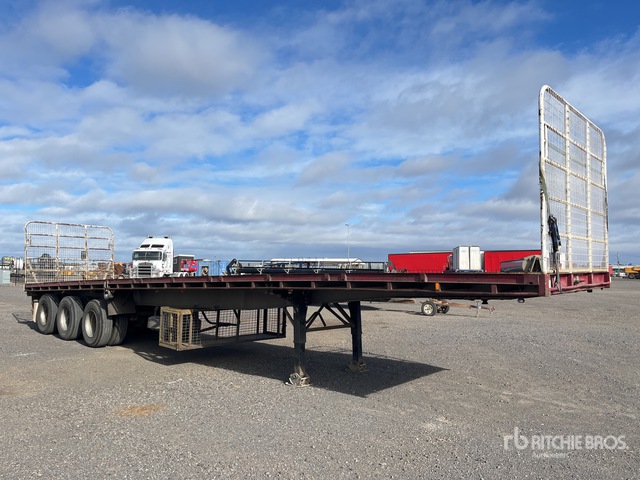 1988 Barker 13.6 m Tri/A Flatbed Trailer | Ritchie Bros. Auctioneers