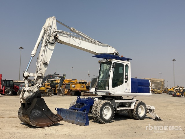 2001 Cat M318 Wheel Excavator | Ritchie Bros. Auctioneers
