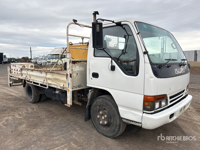 1995 Isuzu NPR 250 4x2 Flatbed Truck | Ritchie Bros. Auctioneers