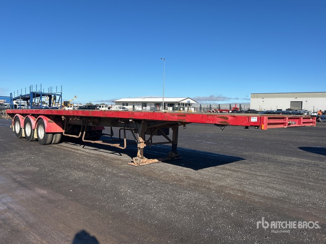 1994 Krueger 13.4 m Tri/A Flatbed Trailer | Ritchie Bros. Auctioneers
