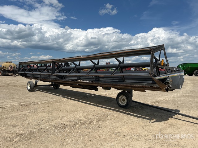 1995 MacDon 960 36 ft Draper Combine Header | Ritchie Bros. Auctioneers