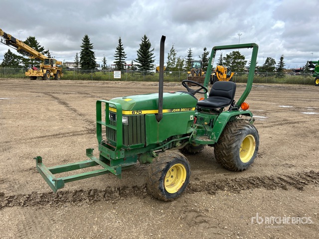 1989 John Deere 670 4WD Utility Tractor | Ritchie Bros. Auctioneers