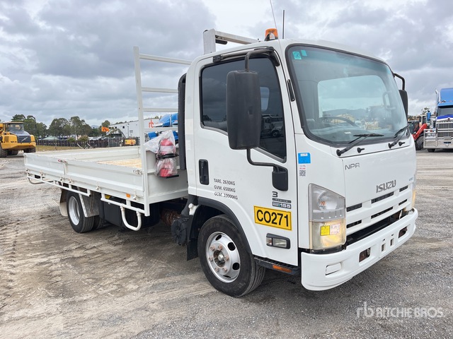 2015 Isuzu NPR 300 4x2 Flatbed Truck | Ritchie Bros. Auctioneers