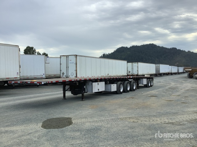 2013 Doepker 32 ft Tri/A B-Train Lead Flatbed Trailer | Ritchie Bros ...