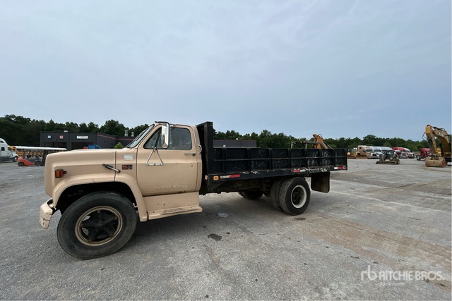 1984 GMC C7000 4x2 Flatbed Dump Truck | Ritchie Bros. Auctioneers
