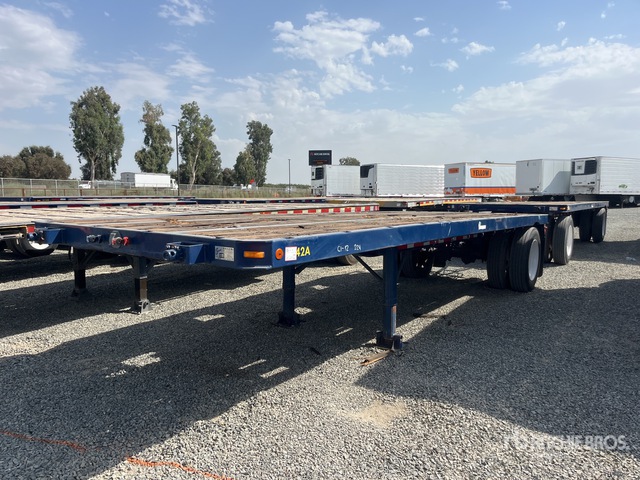 1967 Brown 24 ft S/A Flatbed Trailer | Ritchie Bros. Auctioneers