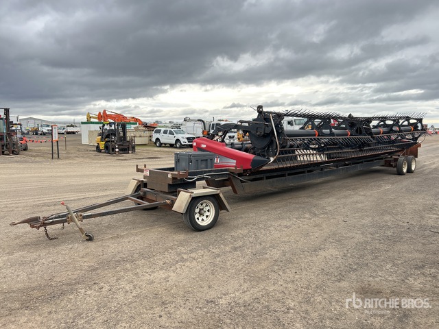 2012 MacDon 2 Row 28 ft Draper Windrower Header | Ritchie Bros. Auctioneers
