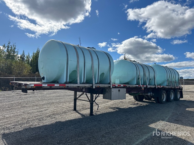 1995 Lode King Tri/A 48 ft Flatbed Remolque de tanque de agua | Ritchie ...