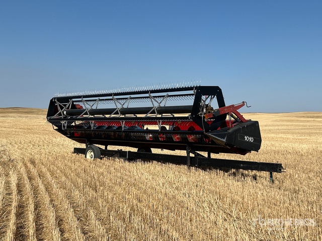 1989 Case IH 1010 25 ft Rigid Combine Header | Ritchie Bros. Auctioneers
