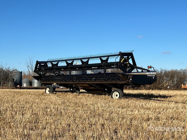 1999 MacDon 962 30 ft Draper Combine Header | Ritchie Bros. Auctioneers