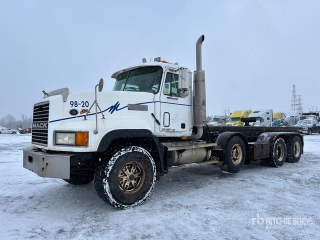 1998 Mack CL713 8x4 Roll-Off Truck | Ritchie Bros. Auctioneers