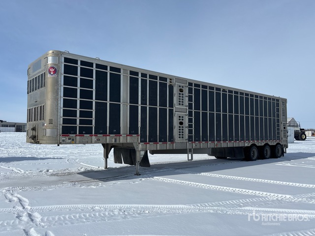 2014 Wilson StockMaster PSADL-400P 53 ft Tri/A Remorque pour bétail ...